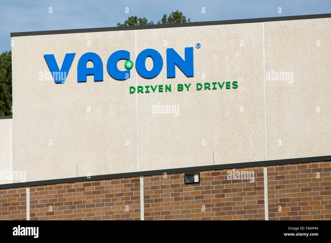A logo sign outside of a facility occupied by Vacon, Inc., in Research ...
