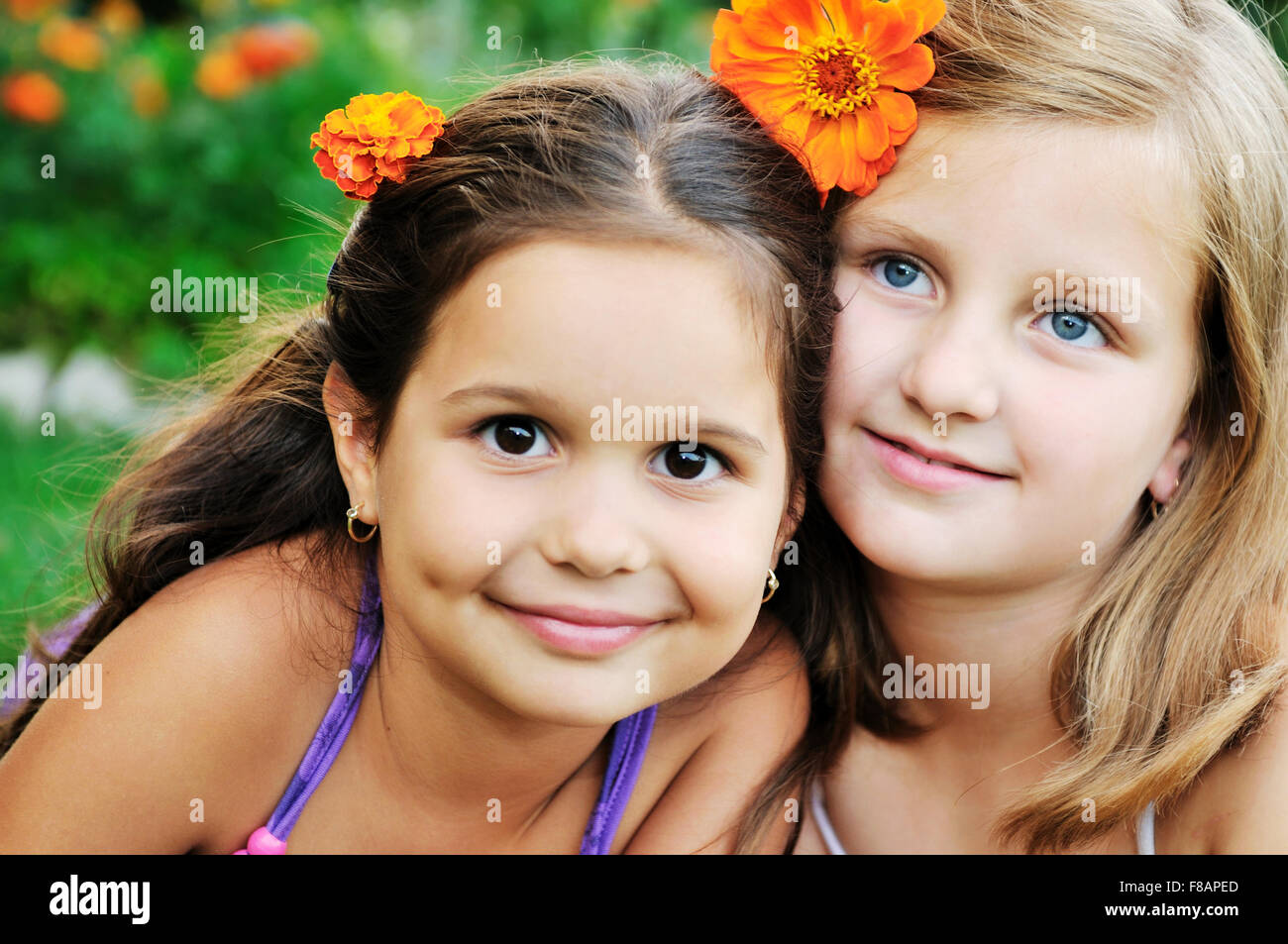 two happy young girls children have fun outdoor in nature Stock Photo ...