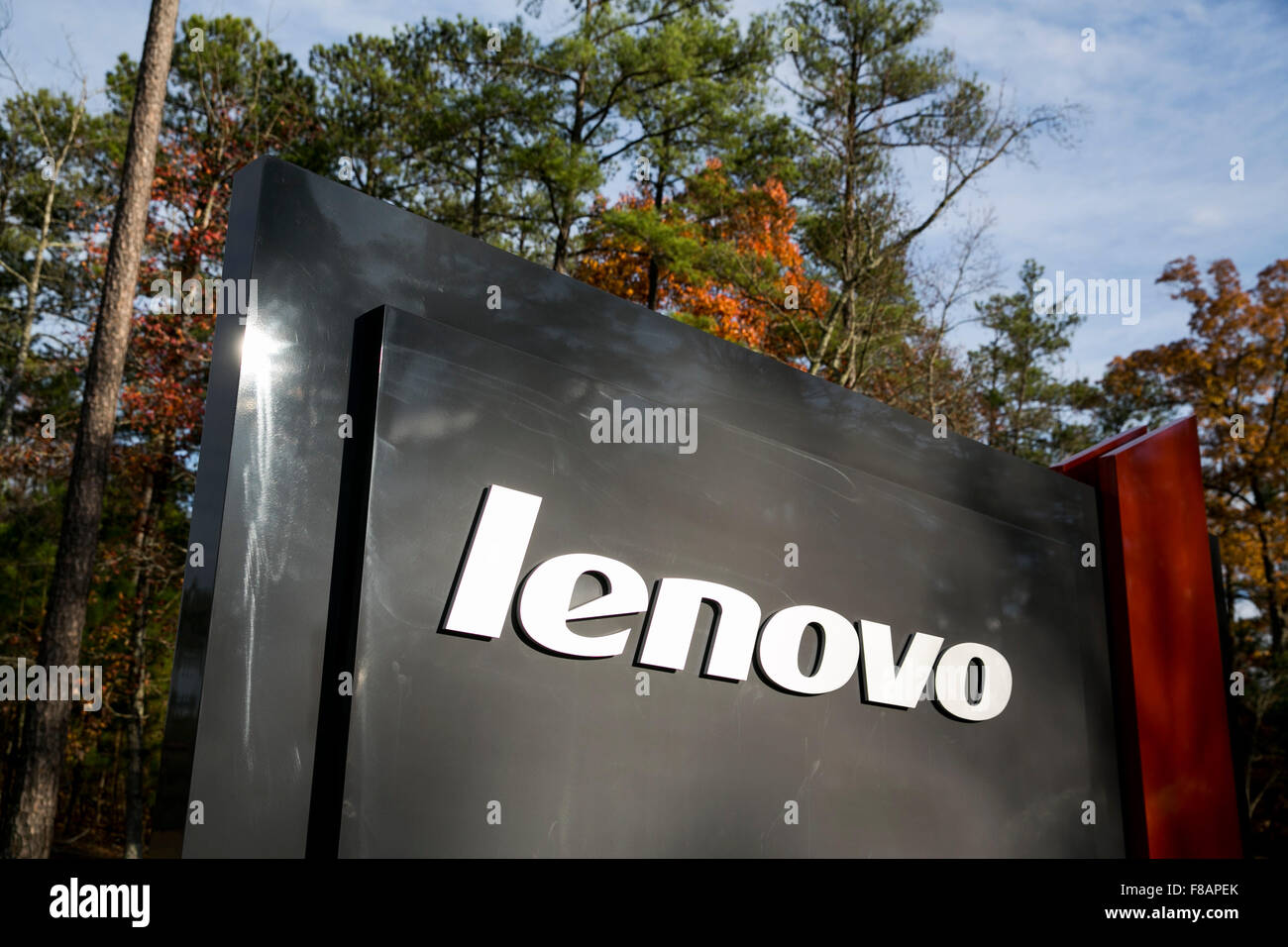 A logo sign outside of a facility occupied by the Lenovo Group in ...