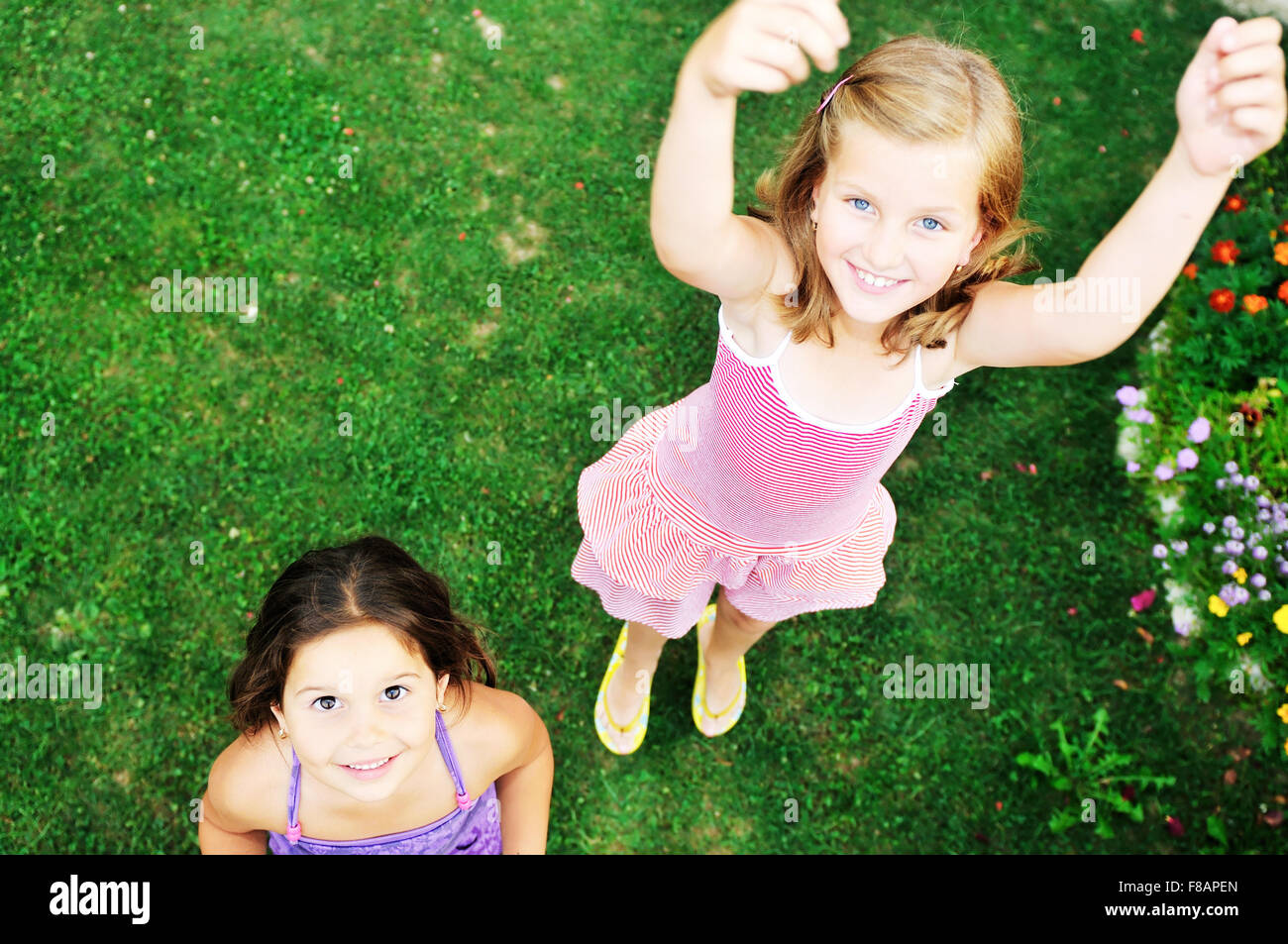 two happy young girls children have fun outdoor in nature Stock Photo ...