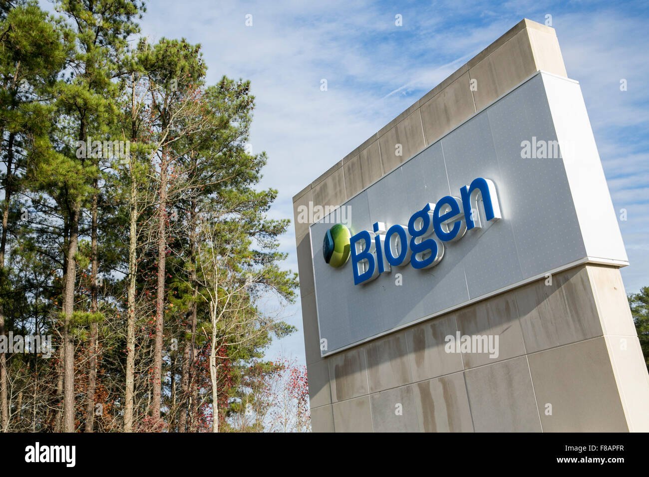 A logo sign outside of a facility occupied by Biogen in Research ...