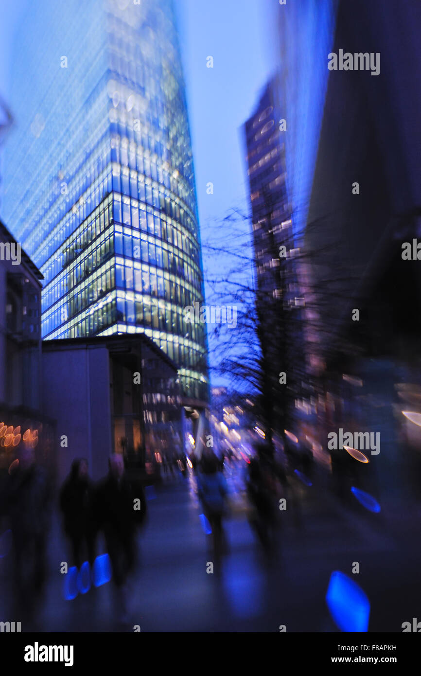 busy traffic scene of street in night with car traffic and vivid ...