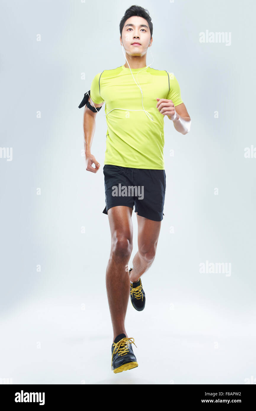 Asian man listening music hi-res stock photography and images - Alamy