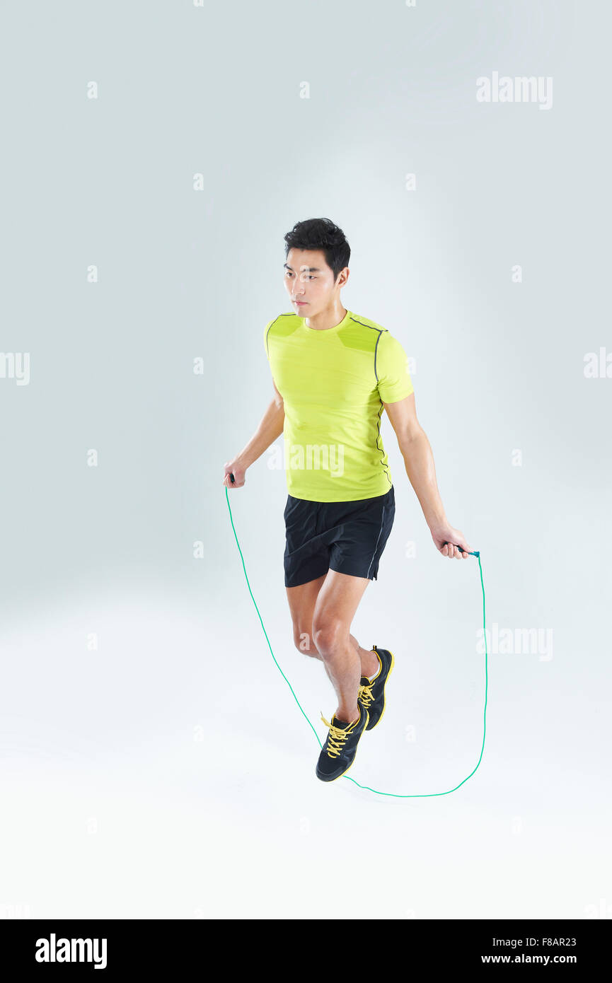 Man jumping rope Stock Photo - Alamy