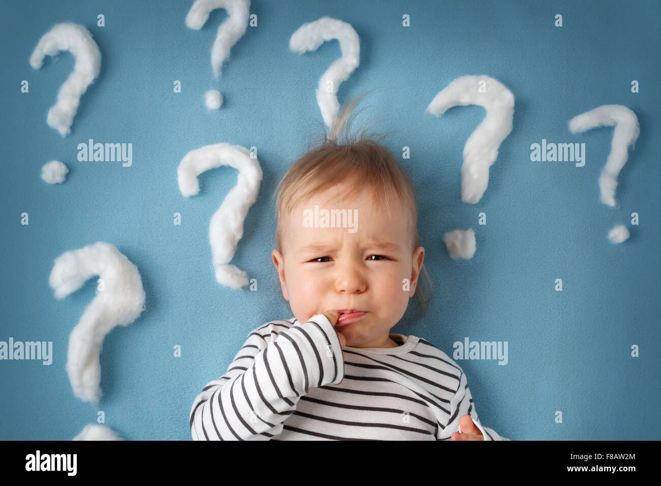 little boy with lots of question marks Stock Photo - Alamy little boy with lots of question marks Stock Photo - Alamy