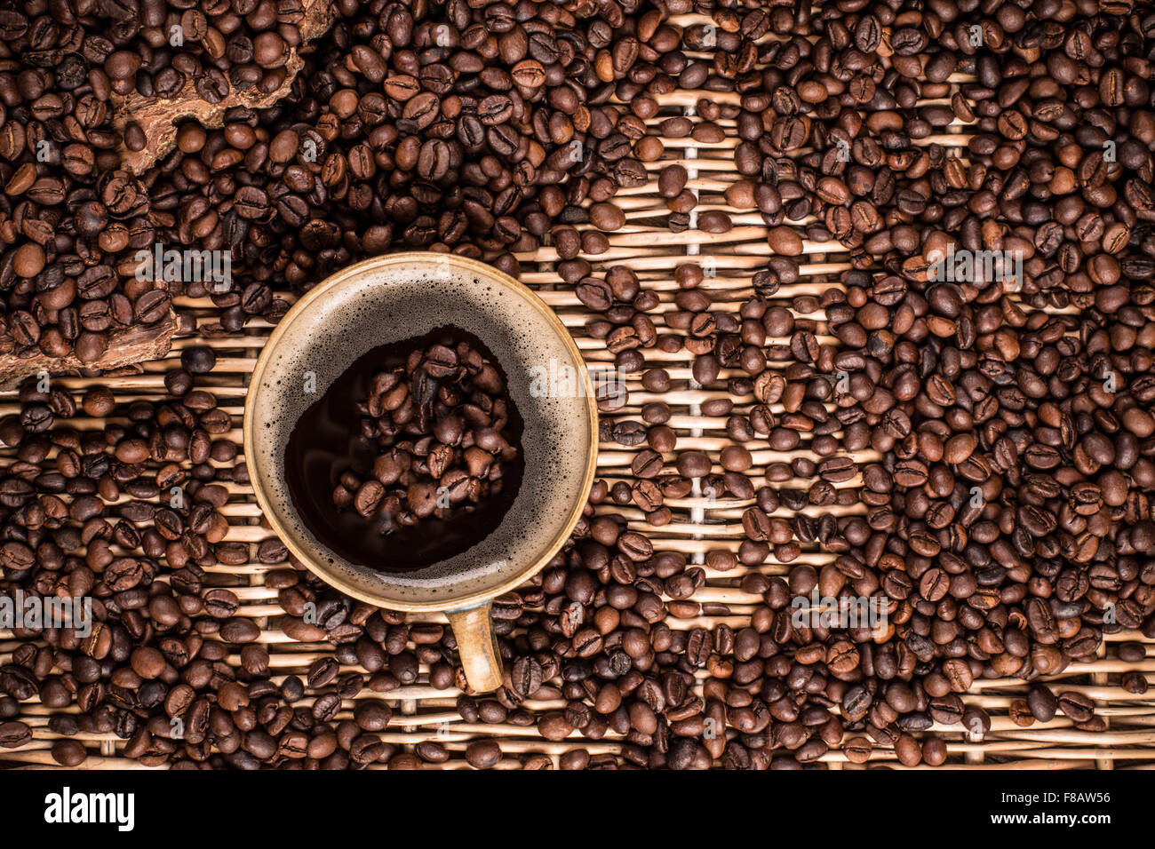 Top view of coffee cup with coffee beans, concept Stock Photo - Alamy