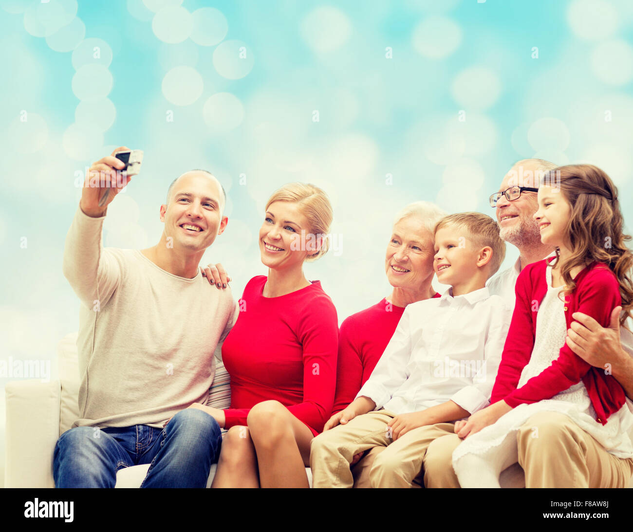 smiling family with camera Stock Photo - Alamy