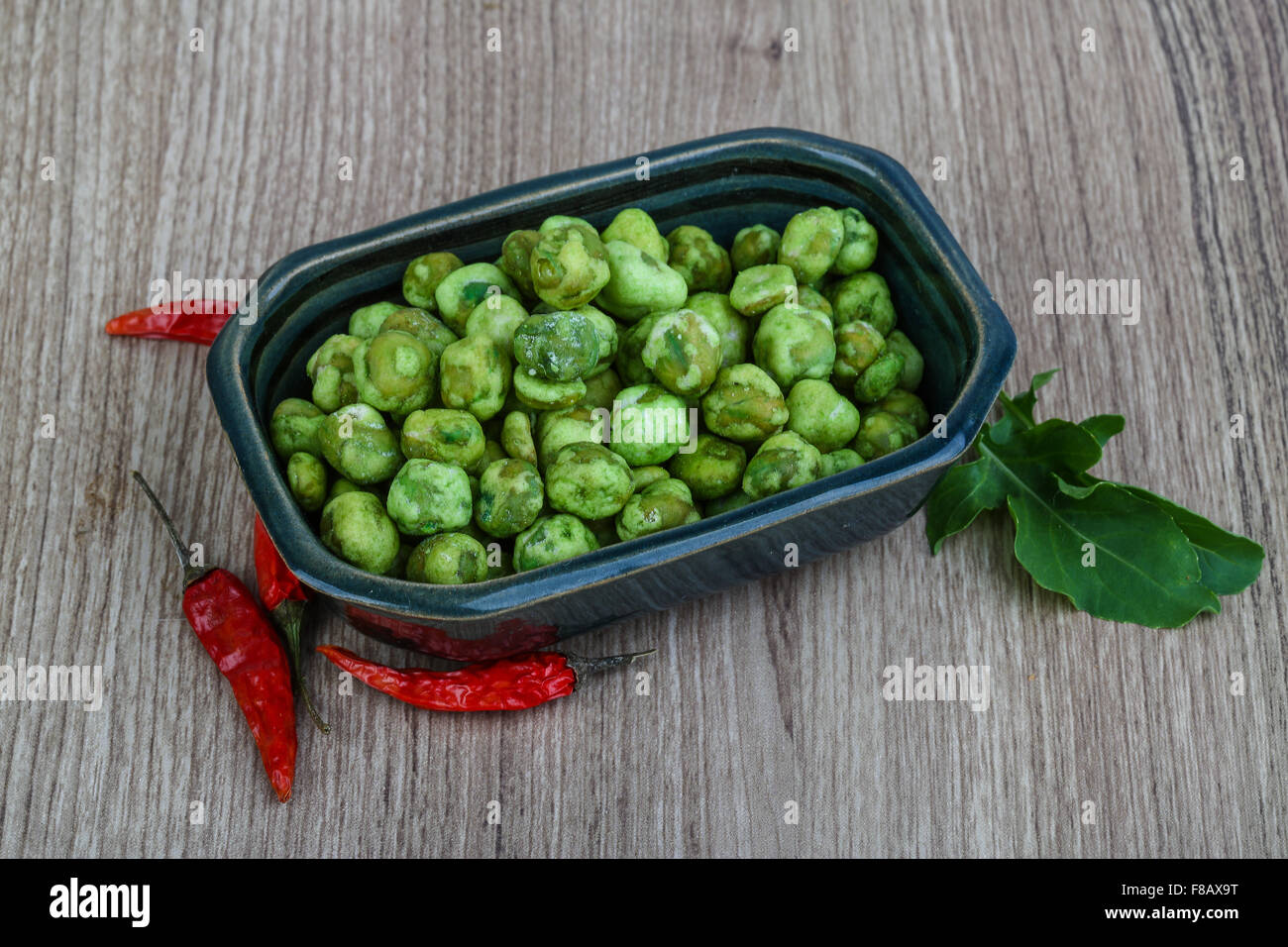 Japan traditional cuisime - Wasabi peas on the wood background Stock ...