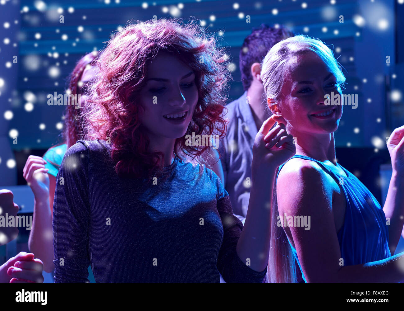 group of happy friends dancing in night club Stock Photo - Alamy