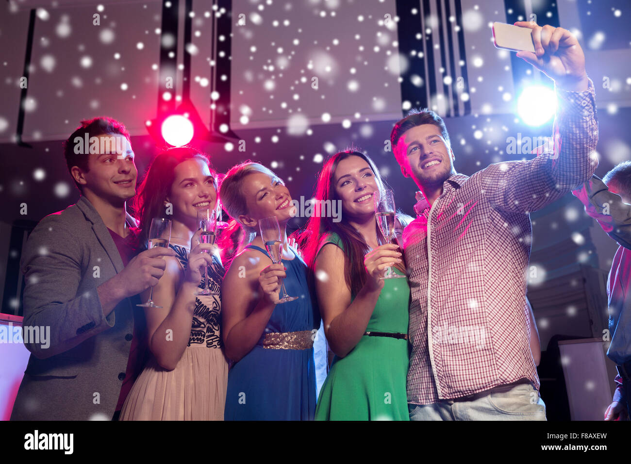 friends with glasses and smartphone in club Stock Photo - Alamy