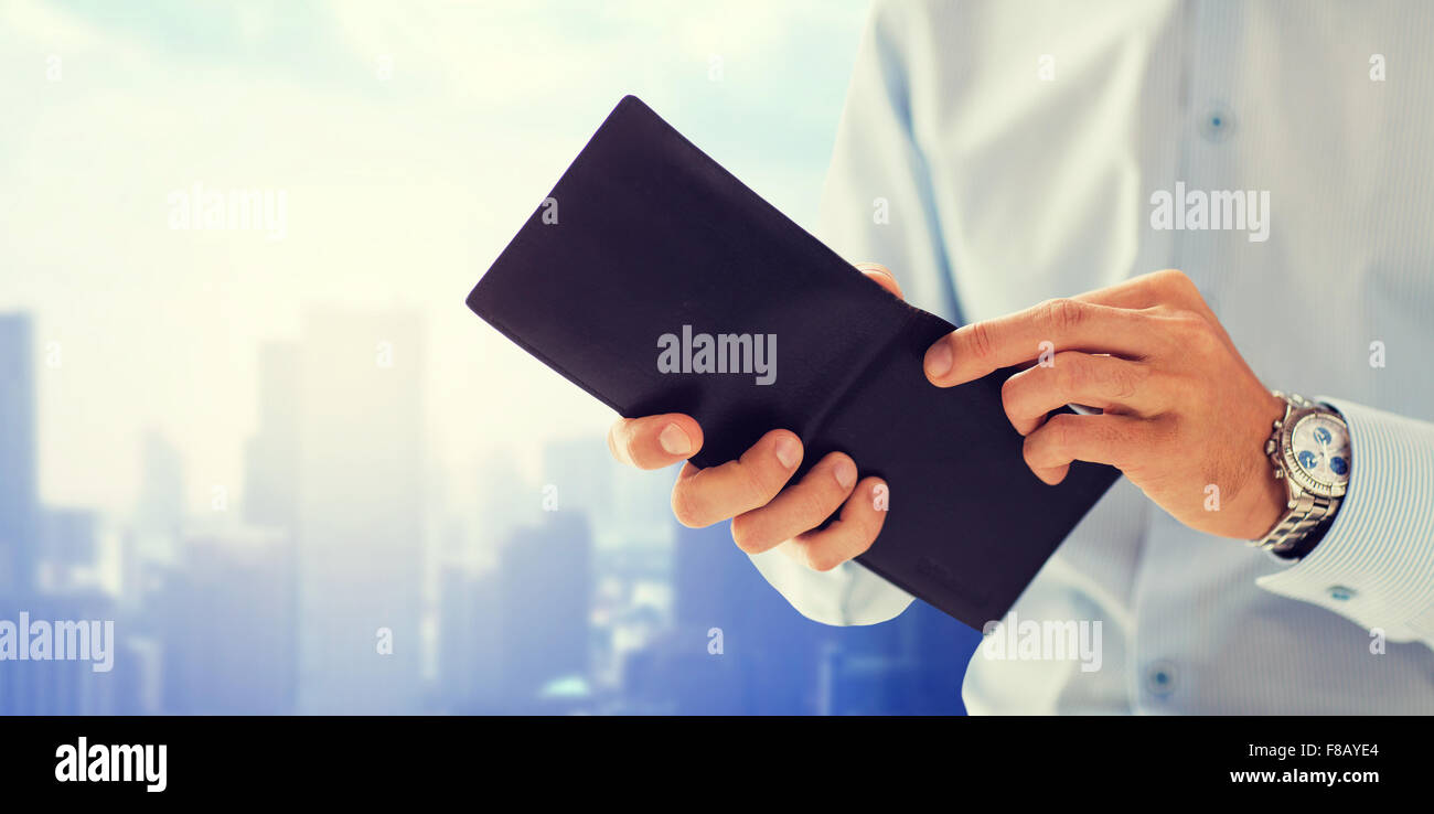close up of businessman hands holding open wallet Stock Photo - Alamy