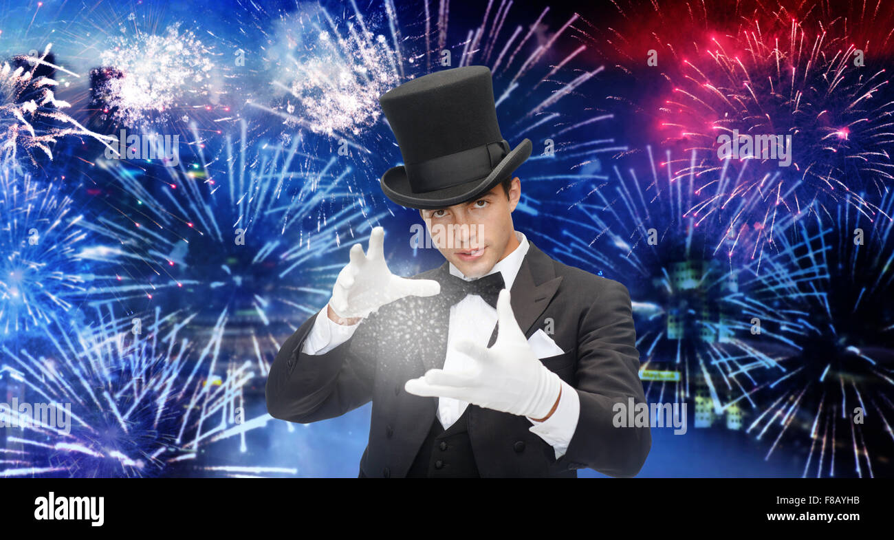 magician in top hat showing trick Stock Photo - Alamy