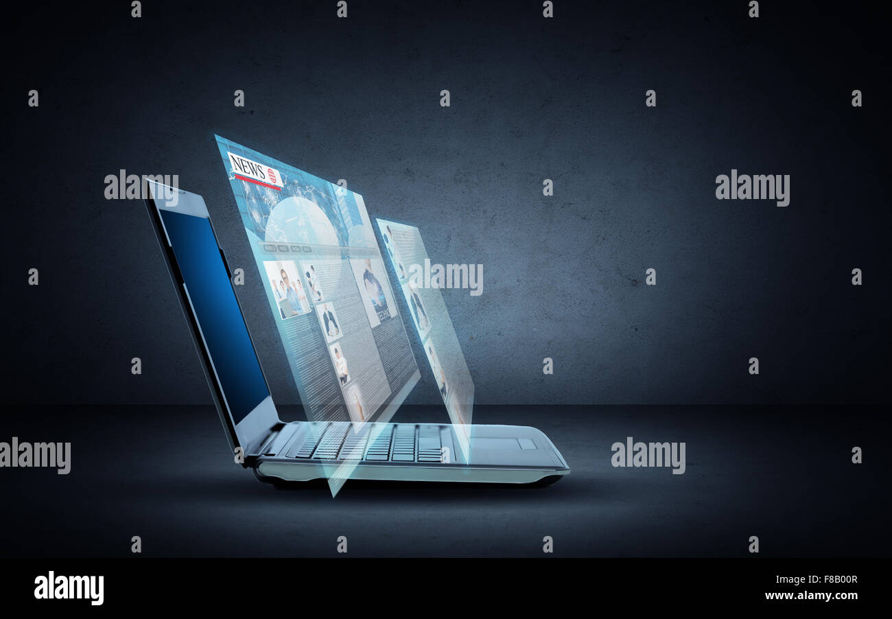 laptop computer with news web page projection Stock Photo - Alamy