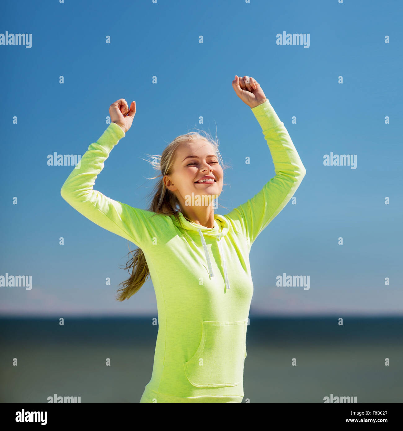 woman runner celebrating victory Stock Photo - Alamy