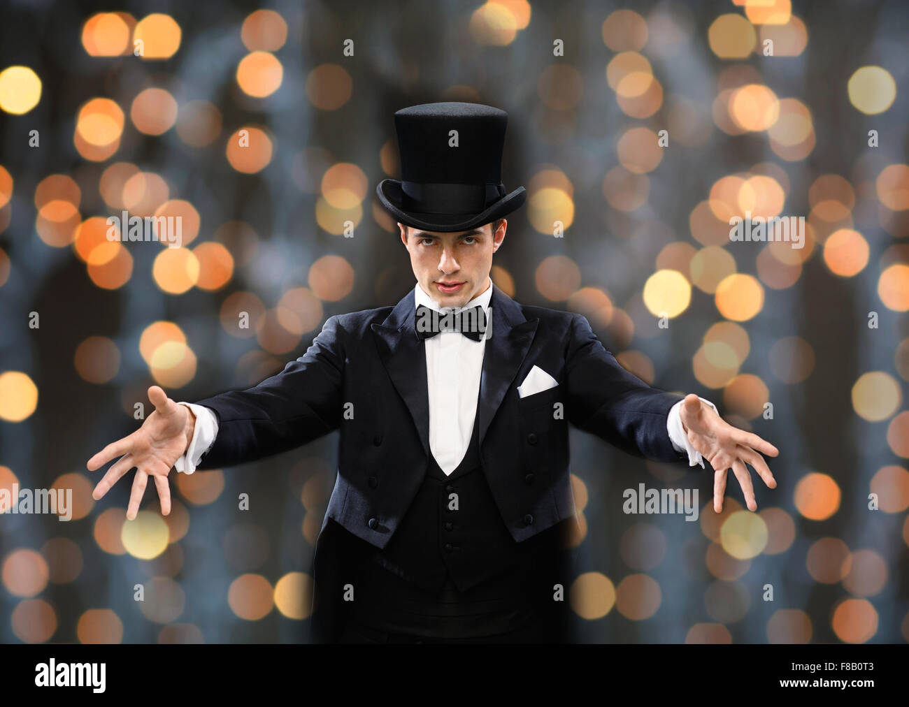 magician in top hat showing trick Stock Photo - Alamy