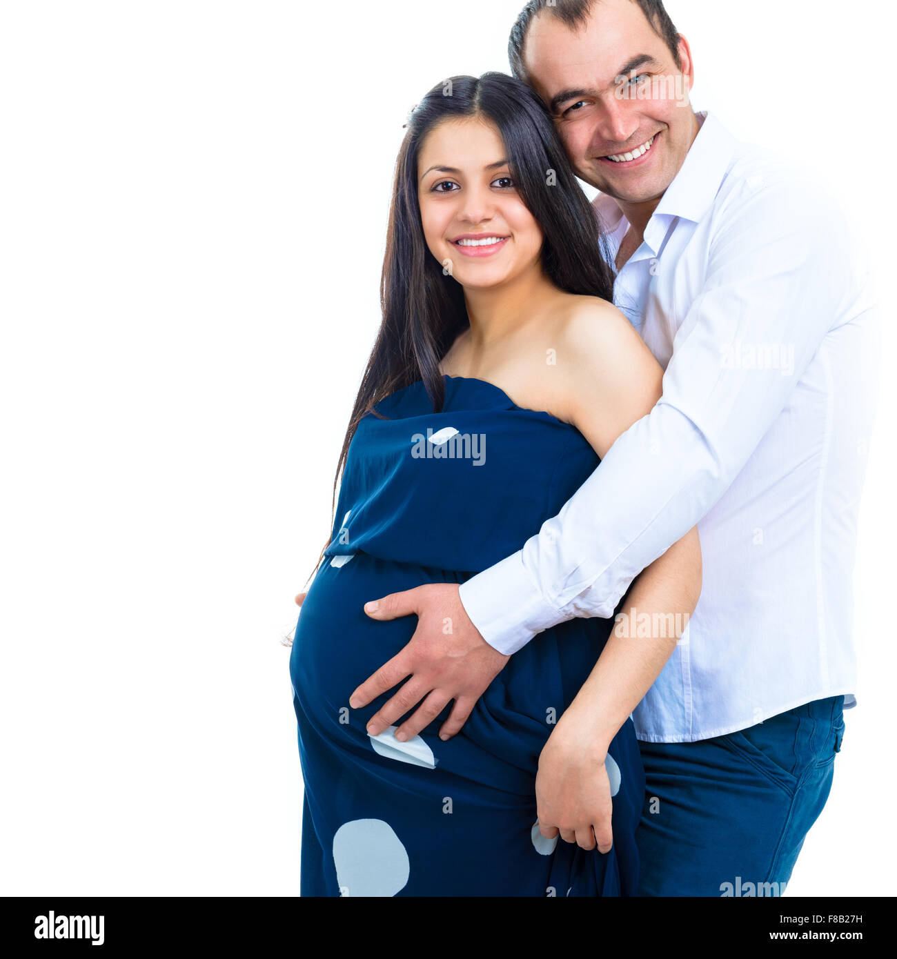Portrait of a beautiful married couple expecting baby Stock Photo - Alamy