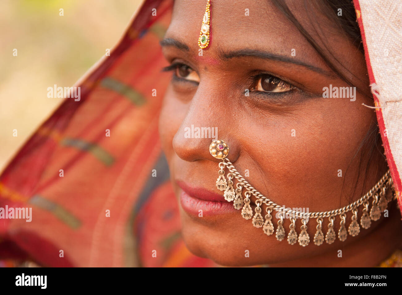 Beautiful Traditional Indian woman in sari costume covered her head ...
