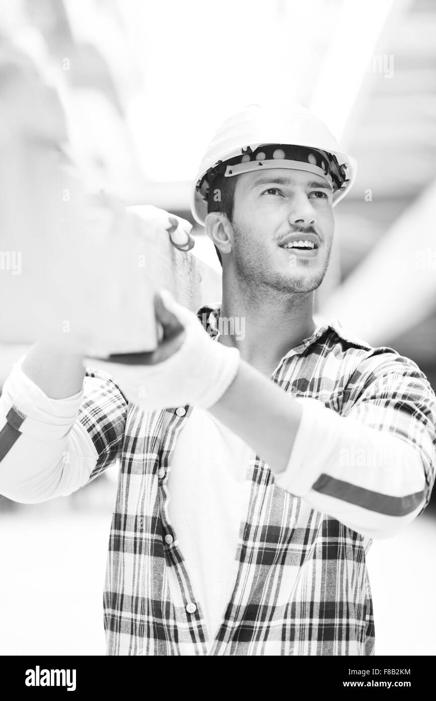 handsome hard worker people portrait at concstruction site Stock Photo ...