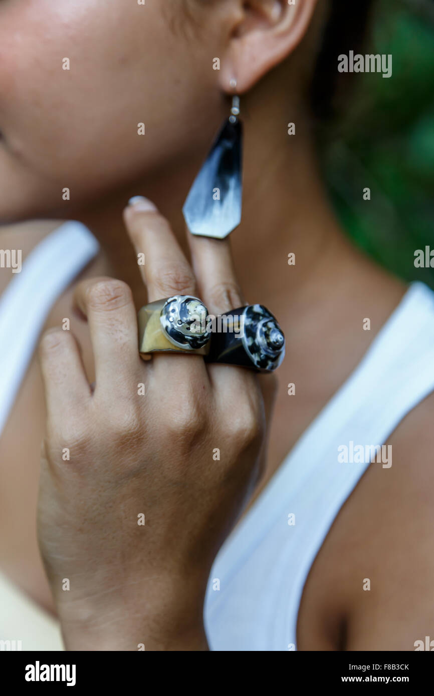 latin girl showing handmade rings Stock Photo - Alamy
