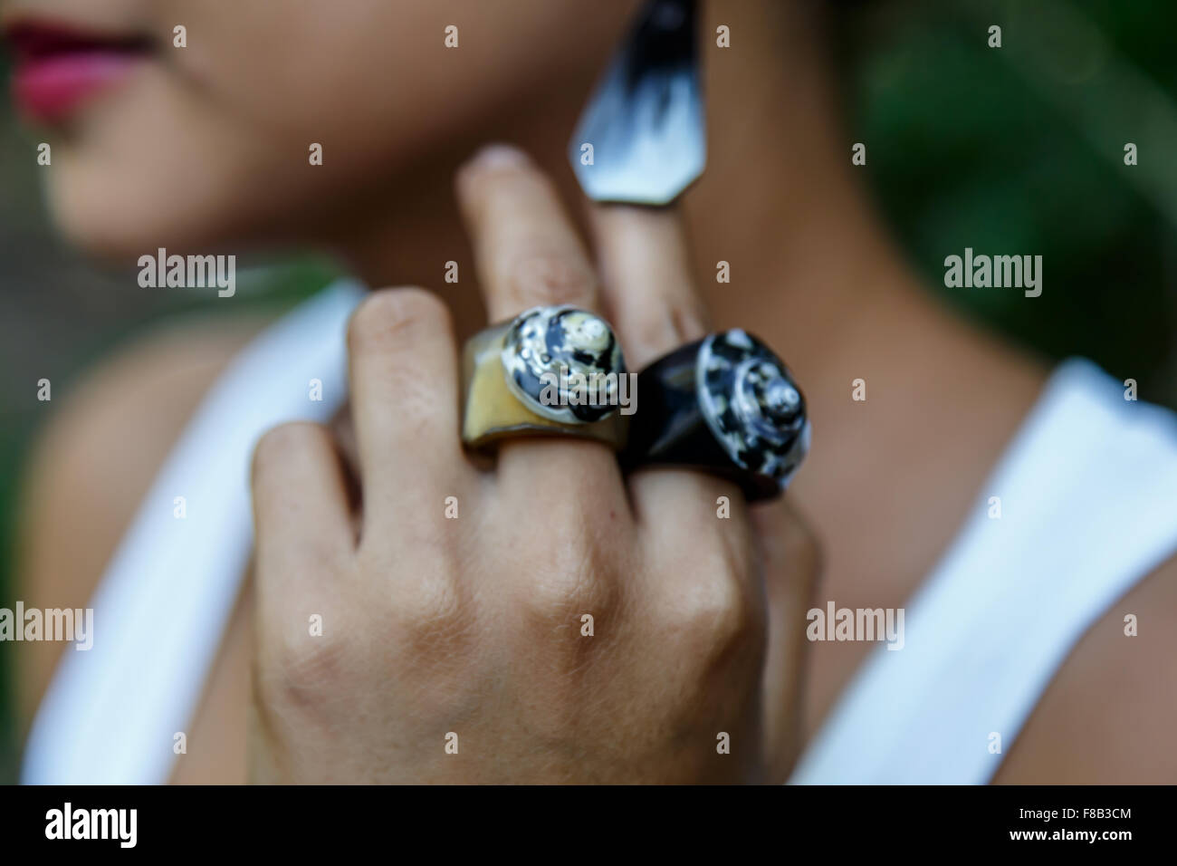 latin girl showing handmade rings Stock Photo - Alamy
