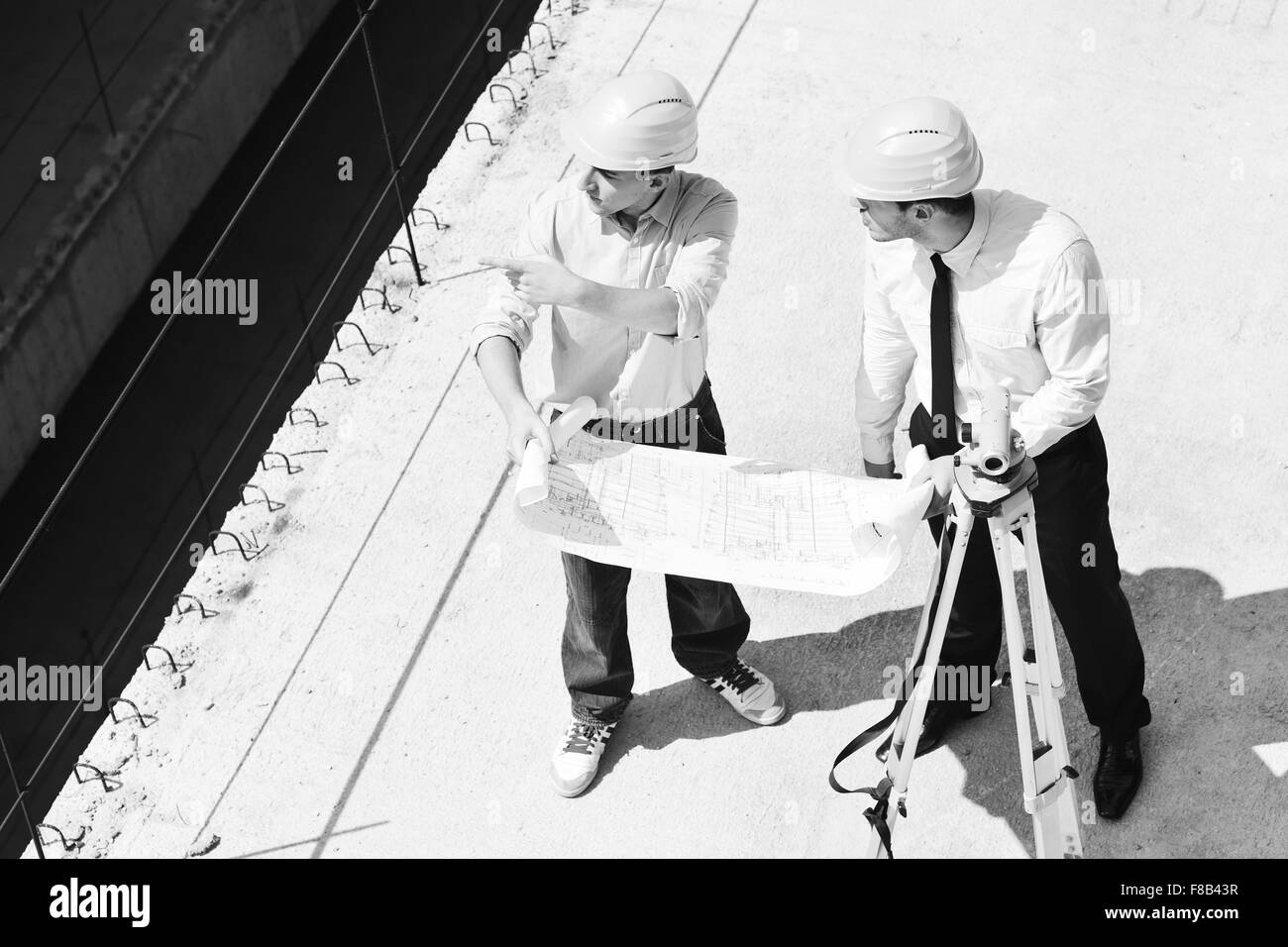 Happy business man check Black and White Stock Photos & Images - Alamy