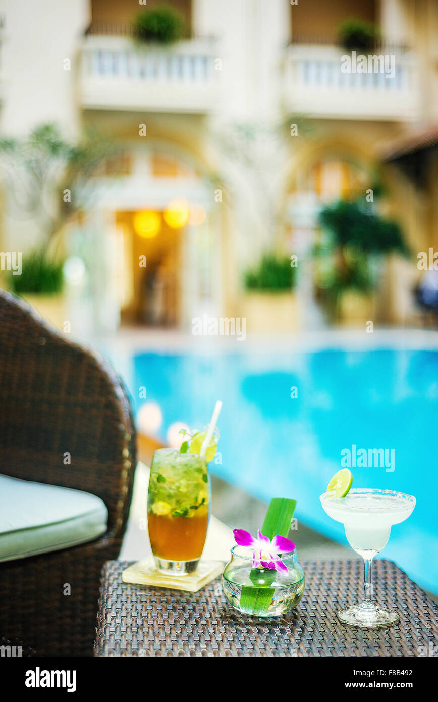 stylish cocktails in exotic elegant classic tropical pool side bar ...