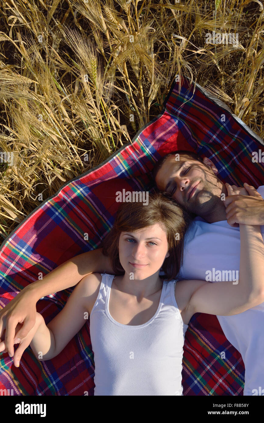 happy young couple in love have romance and fun at wheat field in ...