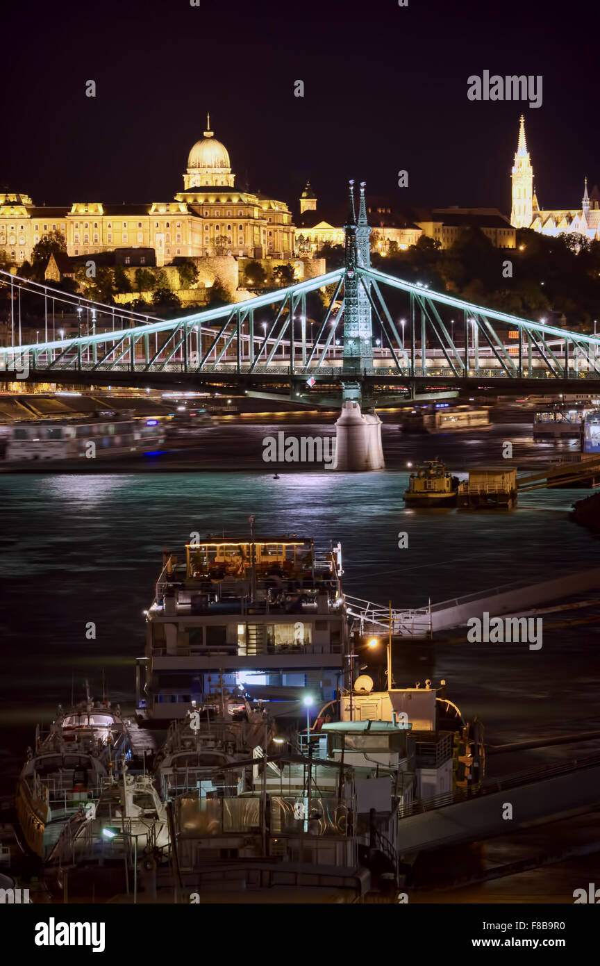 Vertical photo of Budapest city with boats on Danube river Stock Photo ...