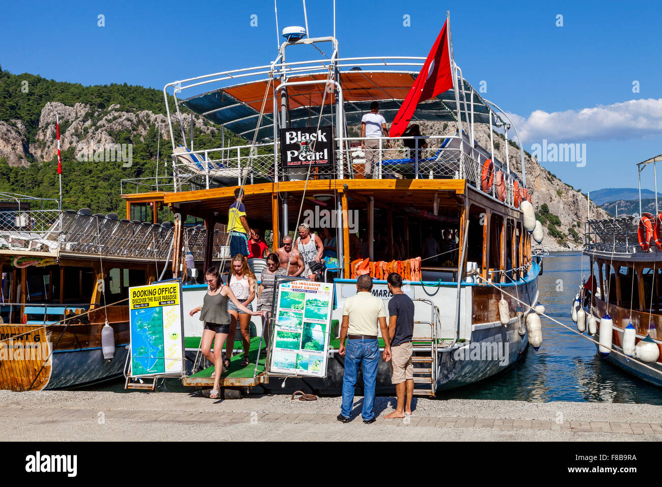 Tourists Disembark At Turunc For The Monday Market Whilst On A Boat ...