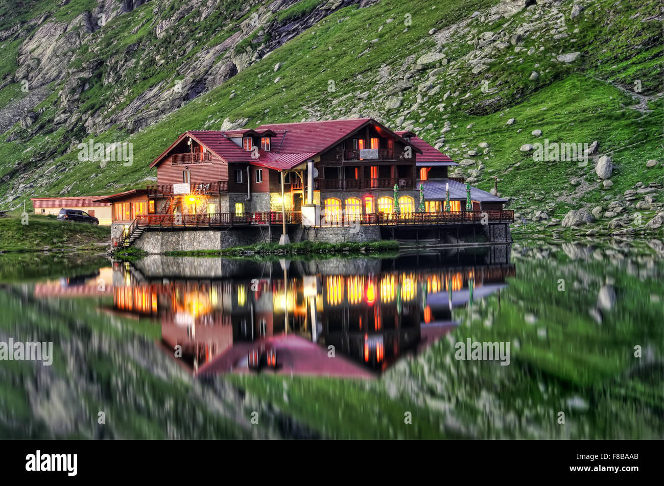 touristic house on lake, Transylvanian Alps, Romania Stock Photo - Alamy