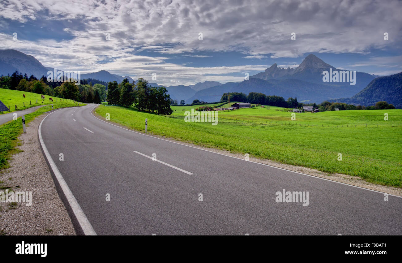 Beautiful road in the Alps of Bavaria Stock Photo - Alamy