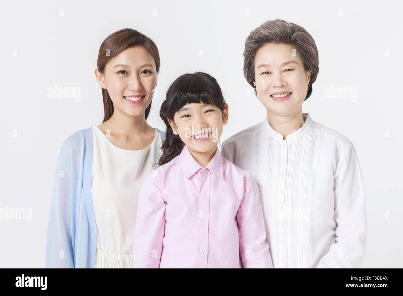 Mother, daughter and granddaughter representing three generations ...