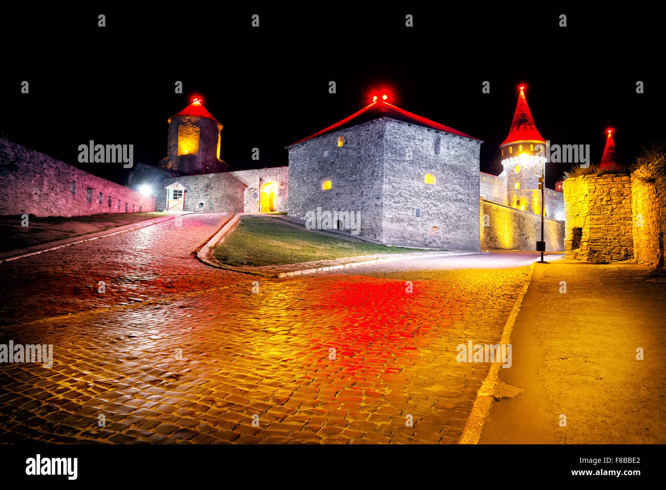 Old Castle on road to tower at night Stock Photo - Alamy
