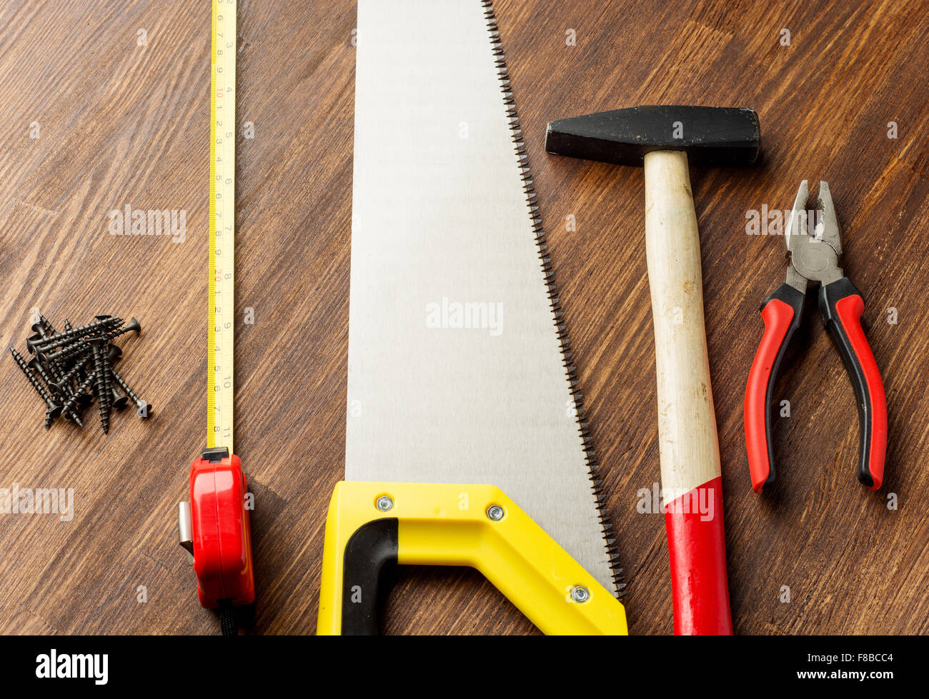 carpenter tools in pine wood table top view Stock Photo - Alamy