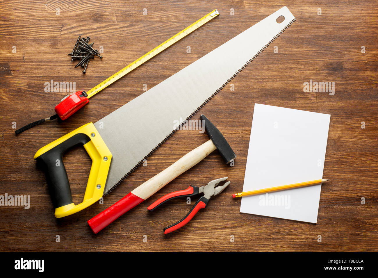 joinery tools on wood table background with note book and copy space ...