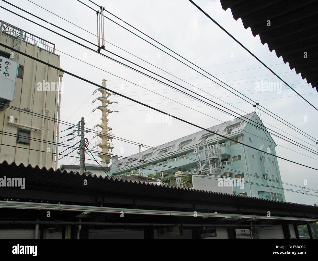 Electric pylon in the city Stock Photo - Alamy