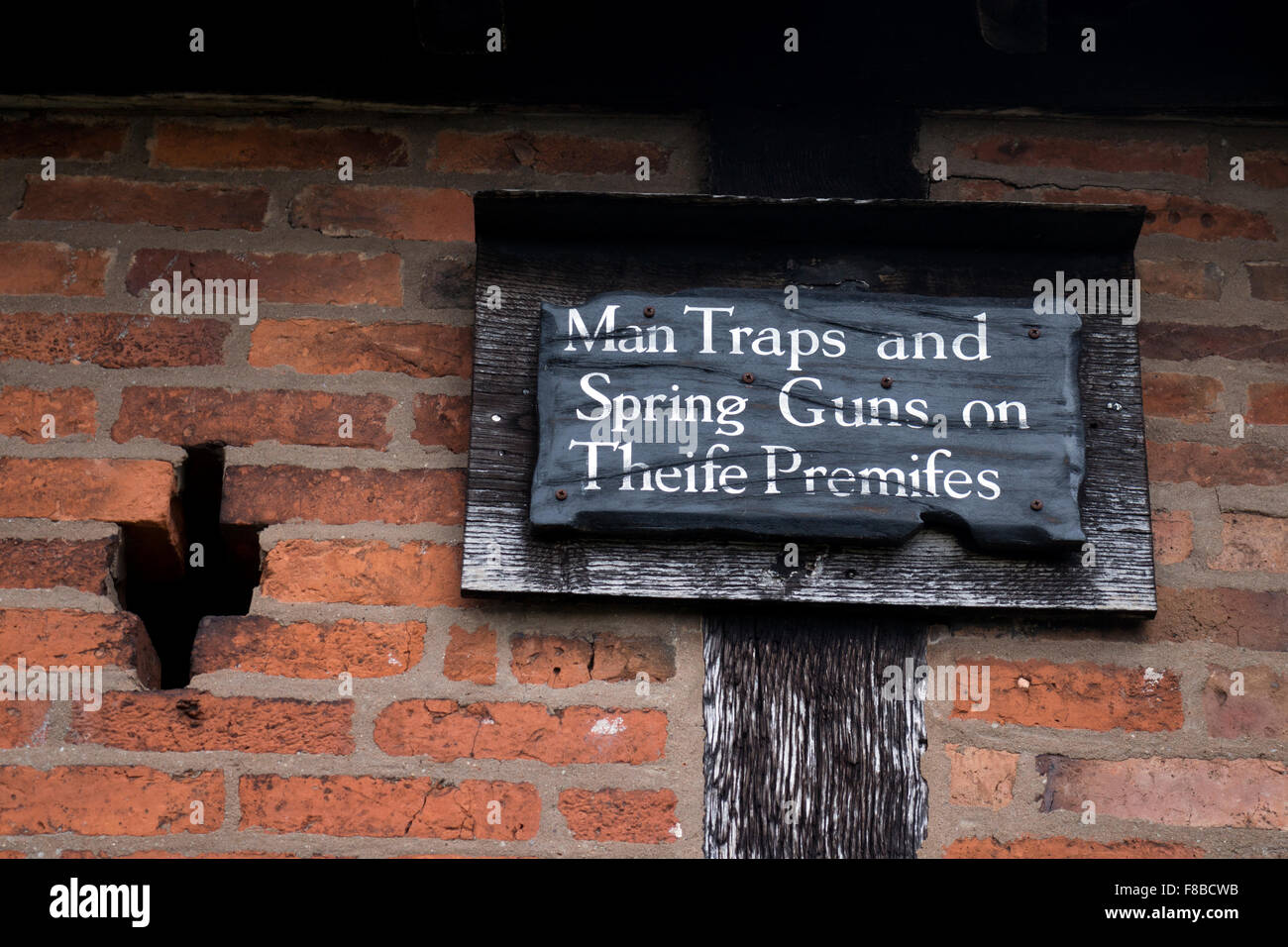 Man traps sign on an old barn, Old Milverton, Warwickshire, England, UK ...