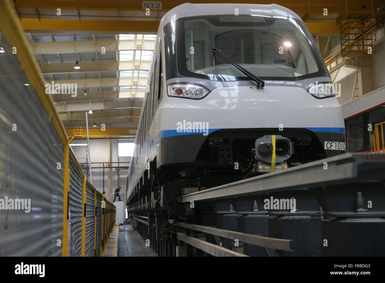 Changsha, China's Hunan Province. 8th Dec, 2015. Technicians adjust ...