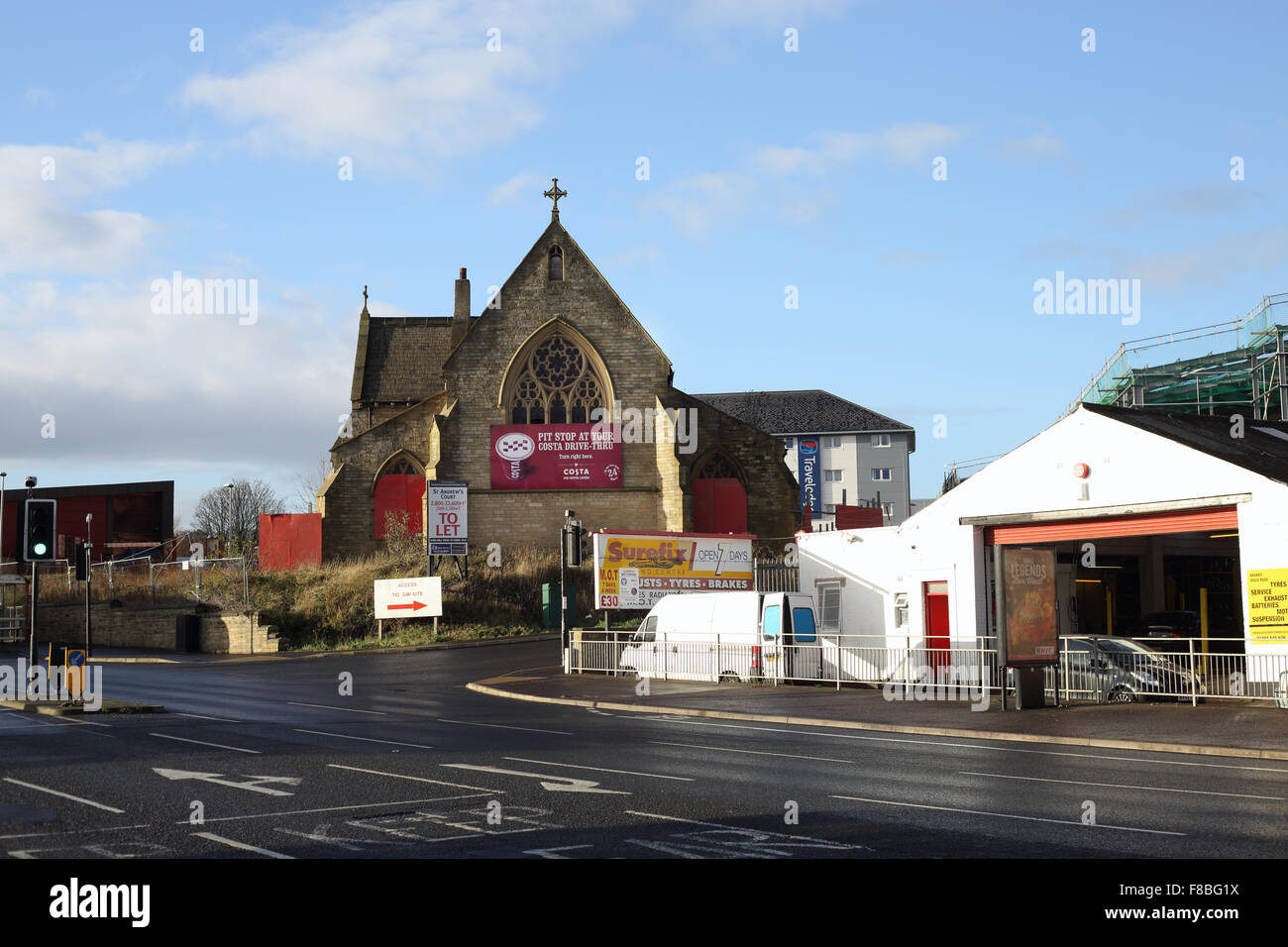 Derelict church in Huddersfield with Costa coffee sign Stock Photo - Alamy