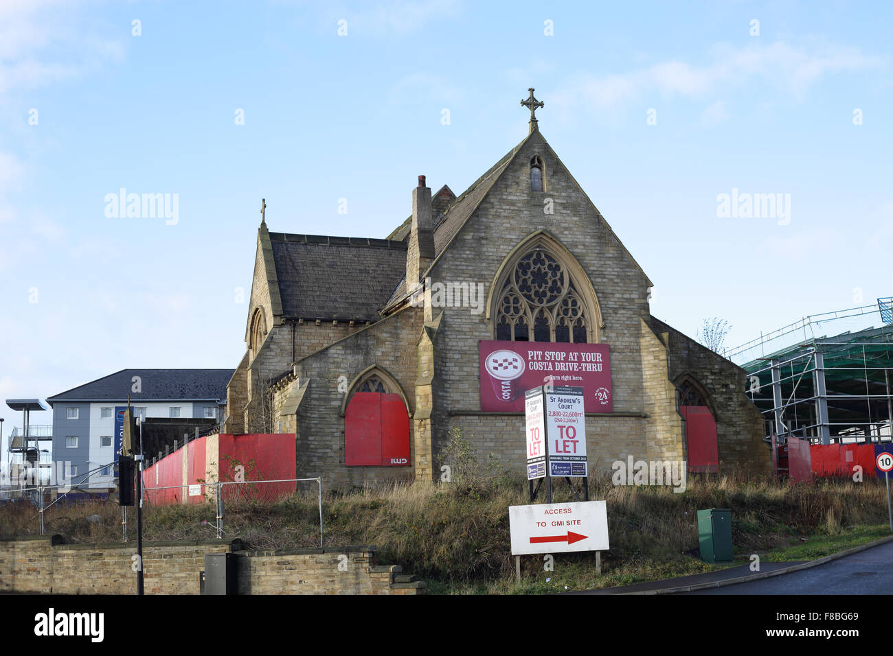Derelict church in Huddersfield with Costa coffee sign Stock Photo - Alamy