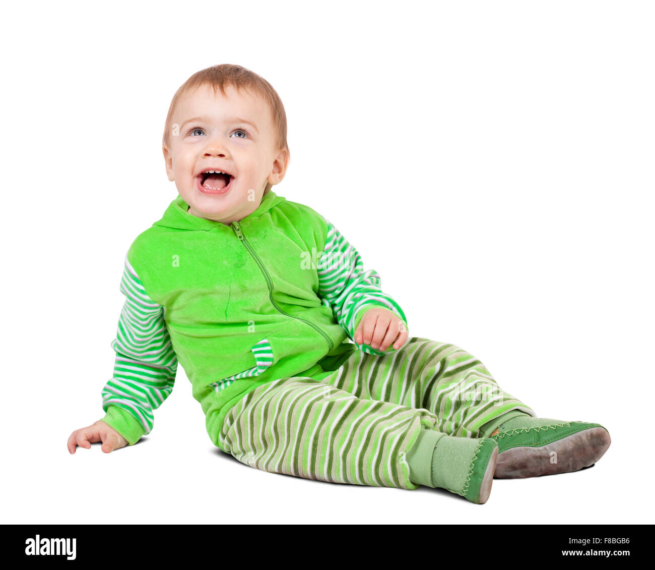 Sitting toddler. Isolated over white background with shadow Stock Photo ...