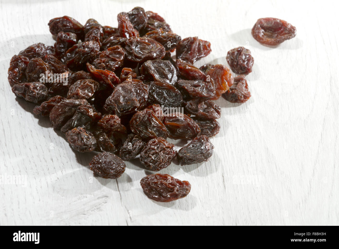 raisins on a gray table Stock Photo - Alamy