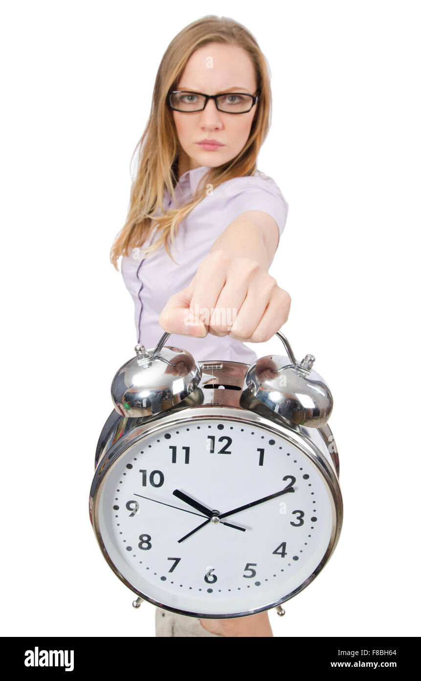 Young employee holding alarm clock isolated on white Stock Photo - Alamy