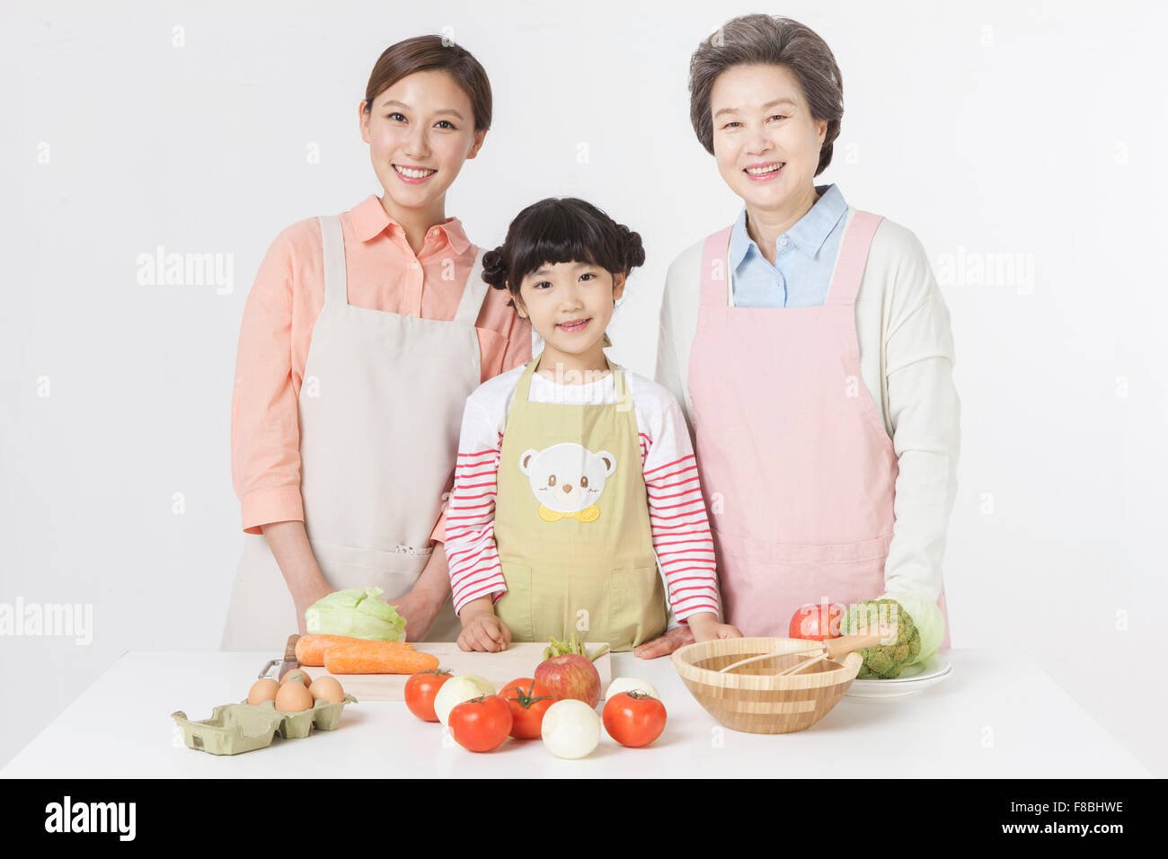 Korean mother and grandmother cooking hi-res stock photography and ...