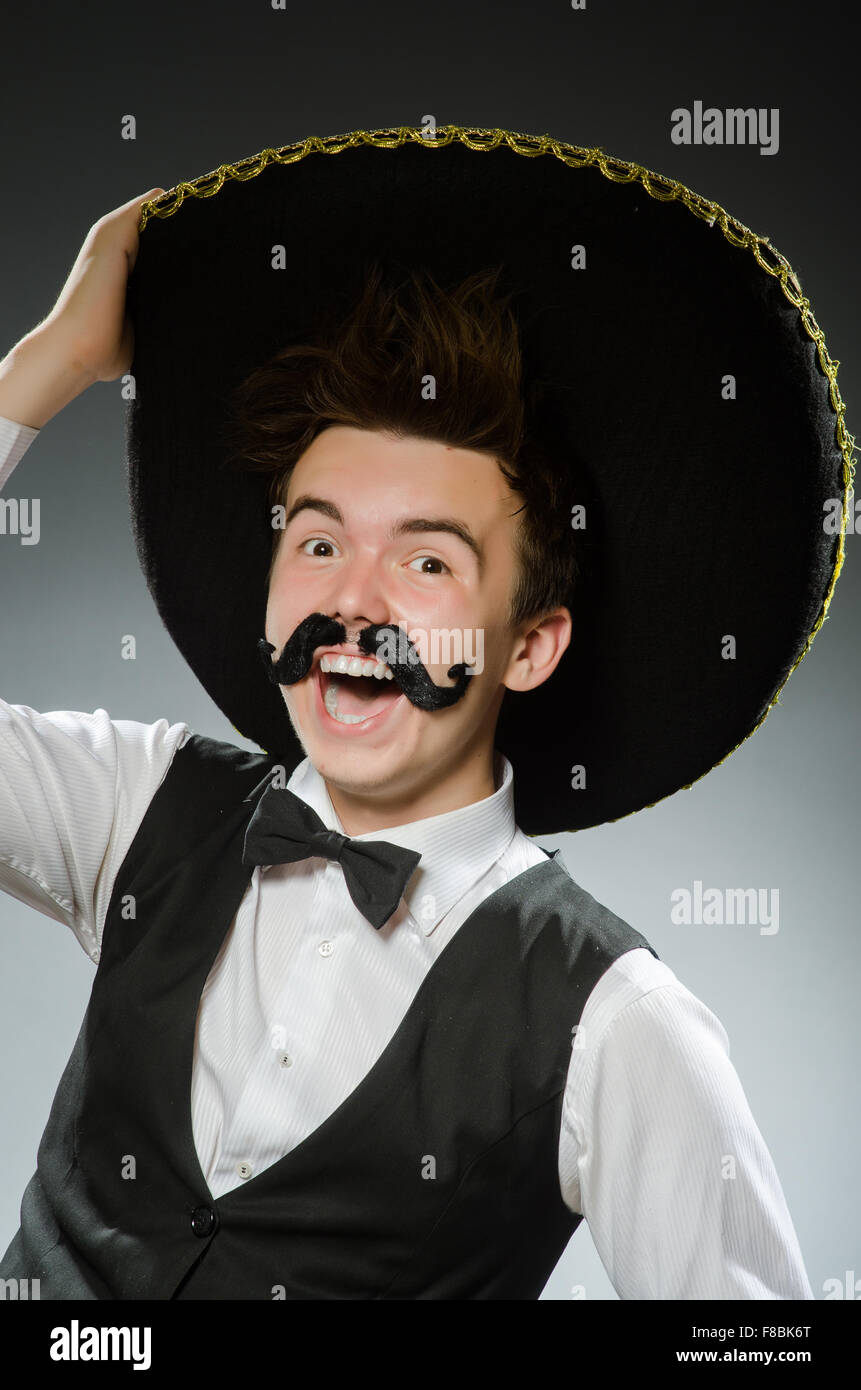Smiling mexican with sombrero isolated on white Stock Photo - Alamy