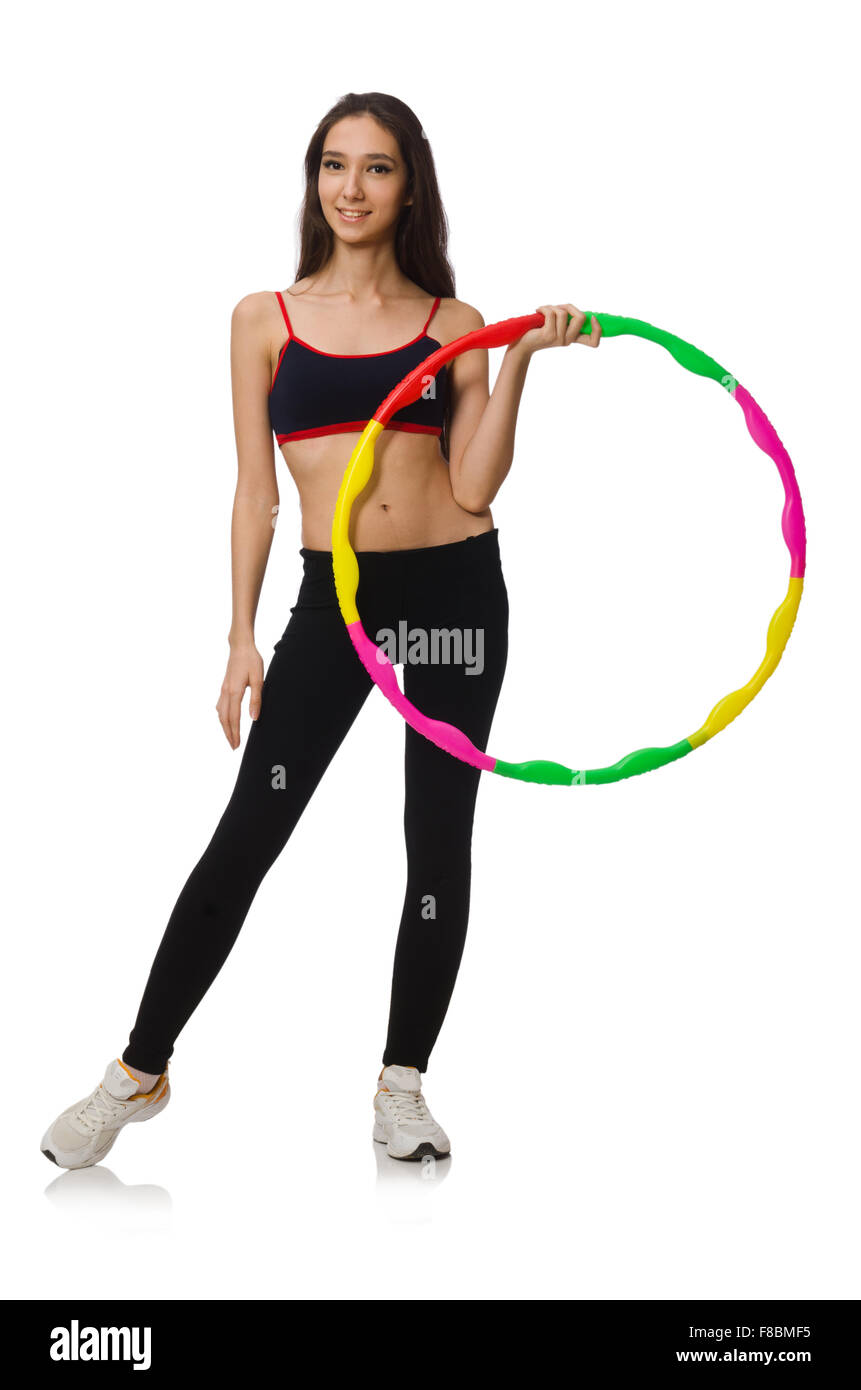A girl in sport suit with hula hoop isolated on white Stock Photo - Alamy