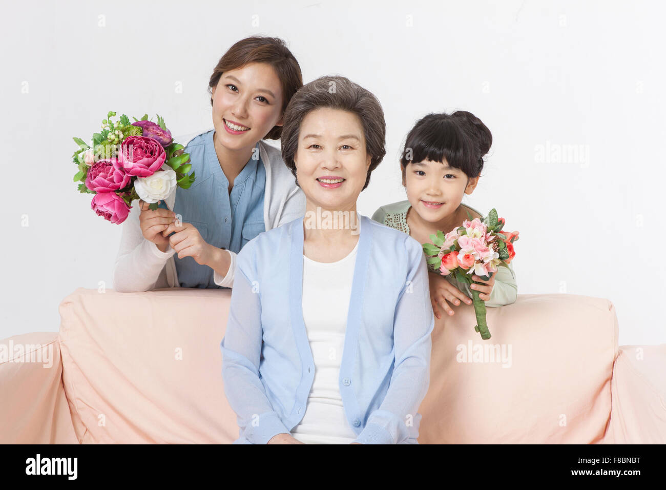 Woman leaning on back sofa hi-res stock photography and images - Alamy