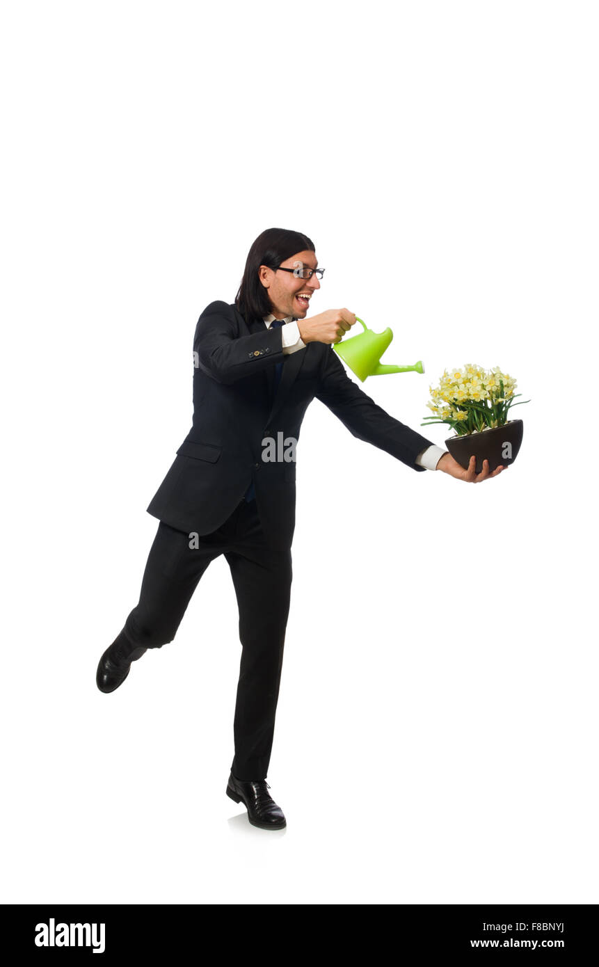 Handsome businessman holding spring flowers isolated on white Stock ...