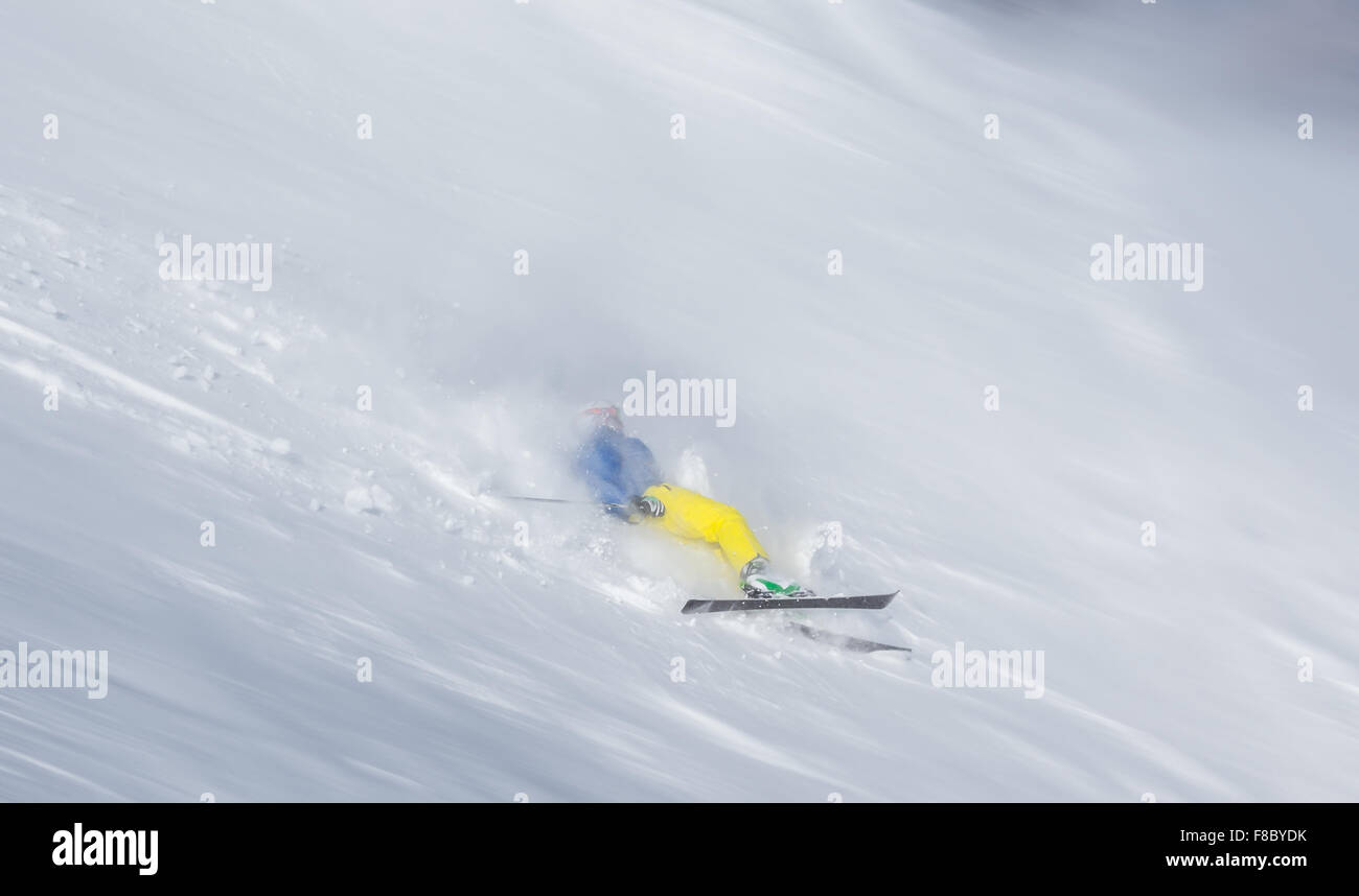 Skier falling on the slope Stock Photo - Alamy