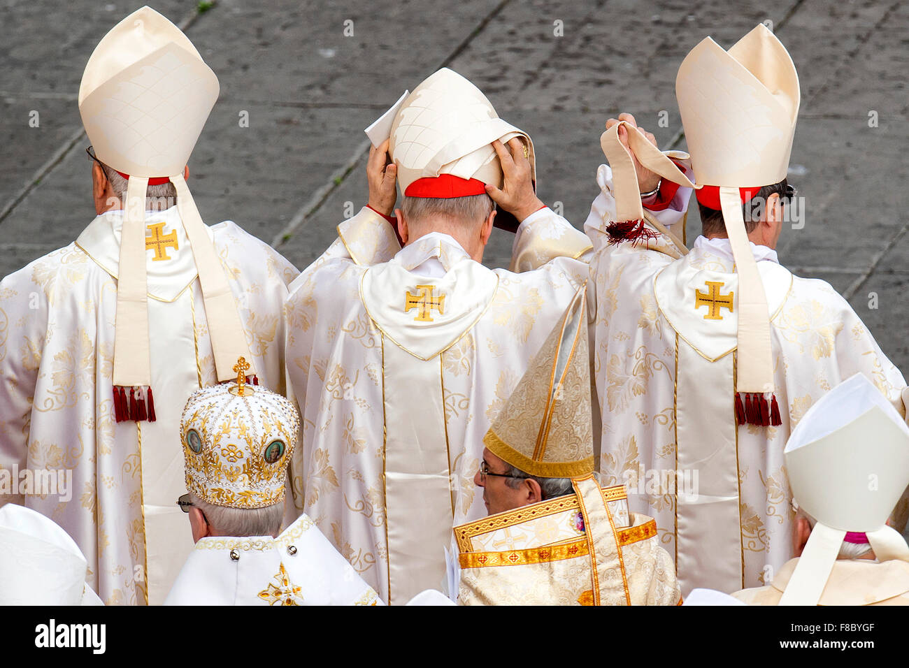 Vatican City. 8-12-2015 A Cardinal adjust his hat during the Holy Year ...